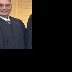 Newly-appointed New Hartford Town Justice David Longeretta is sworn in ...