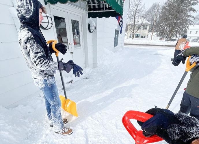 VVS football players help neighbors in Operation Snow Devil | News ...