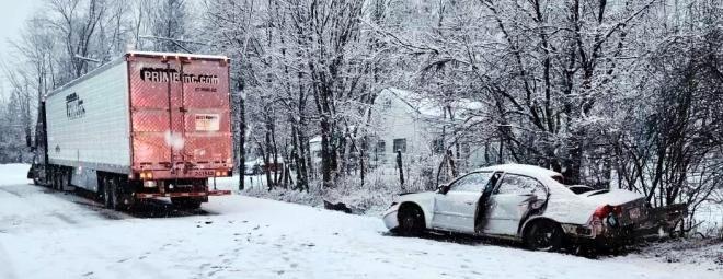 Passenger killed, driver seriously injured after car hits tractor ...