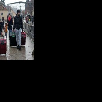 Syria urges Kurdish fighters to surrender after ramping up Aleppo ...