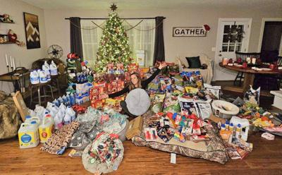 Erin Weldon of Tangles Salon delivers for animal shelters at Christmas ...