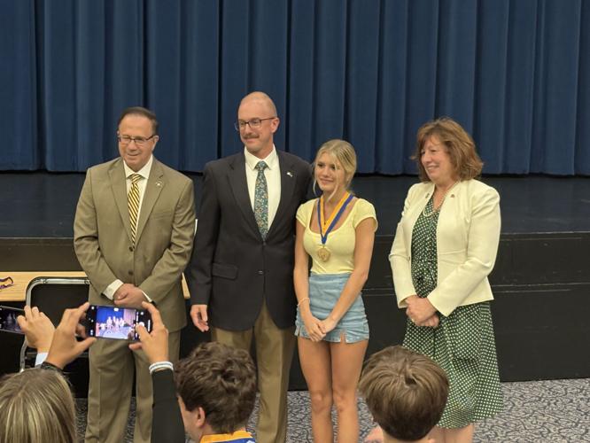 Students receive medals for helping save family from fire | News ...