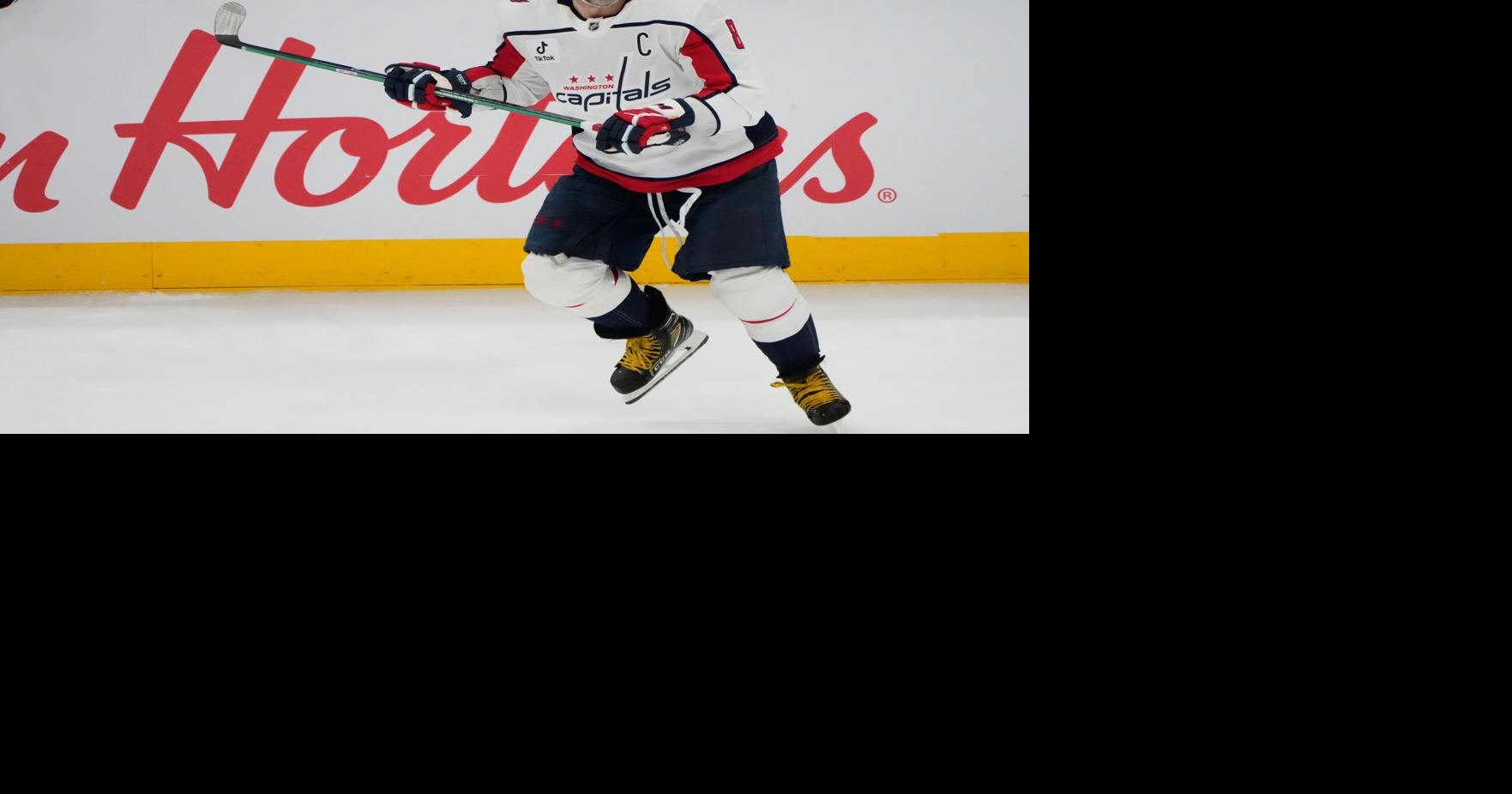 Alex Ovechkin declares 'I'm back!' and re-signs with Capitals to return ...