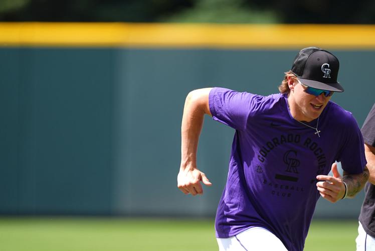 Cole Carrigg triples in Rockies debut and plays with his `hair on fire ...
