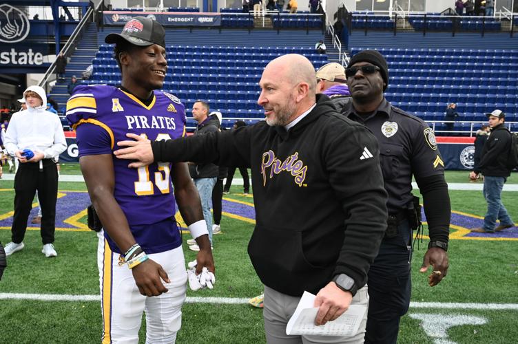 Long ECU touchdown negated by inadvertent whistle, but the Pirates win ...