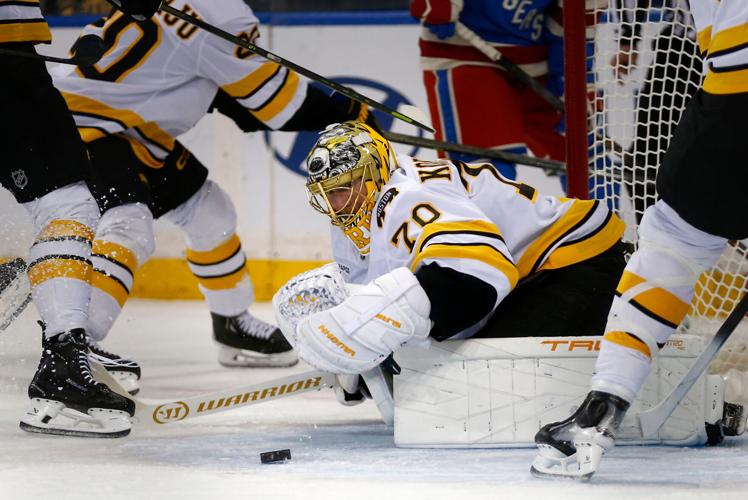 Matthew Robertson scores in OT to lift the Rangers over the Bruins 4-3 ...