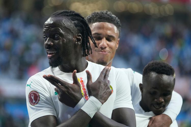 Senegal starts Africa Cup campaign with 3-0 win over Botswana, Nigeria ...