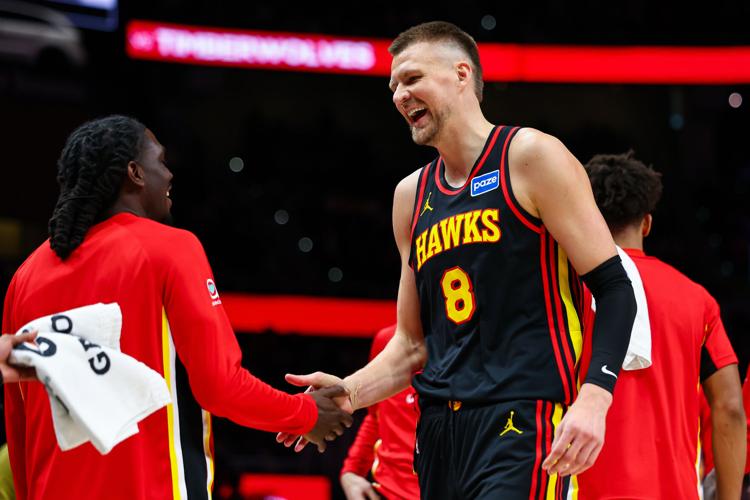 Johnson scores 34 points as Hawks roll past Timberwolves 126-102 to end ...