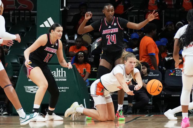 Istanbulluoglu scores 23, No. 10 Louisville tops Miami 77-68 to run ...