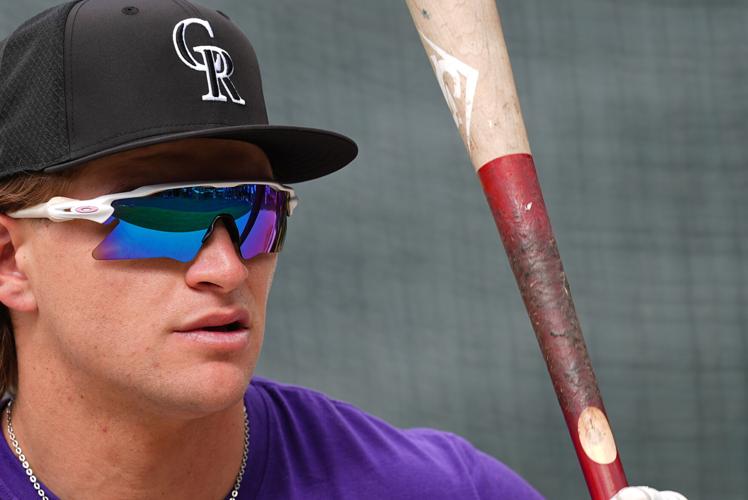 Cole Carrigg triples in Rockies debut and plays with his `hair on fire ...