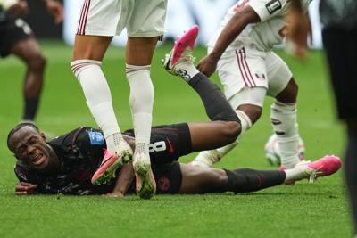 One Extraordinary Photo: Canada's Ismael Kone reacts to his injury ...