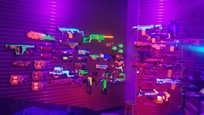 Locked and loaded: Blacklight Nerf Wars opens in the mall | News ...
