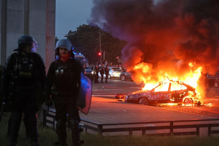 Paris police detain dozens after violence erupts during celebrations of ...