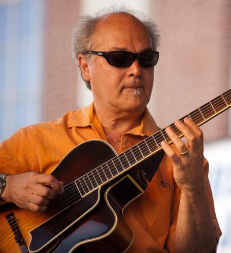 Guitarist Paul Asbell strums a different chord in a newly released book ...