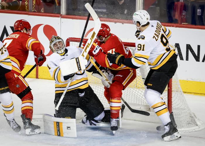 Connor Zary scores on OT power play to lift the Flames past the Bruins ...