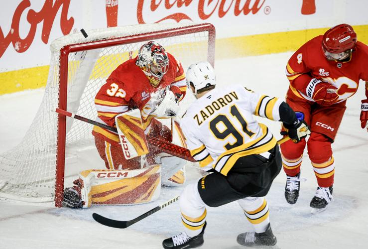 Connor Zary scores on OT power play to lift the Flames past the Bruins ...