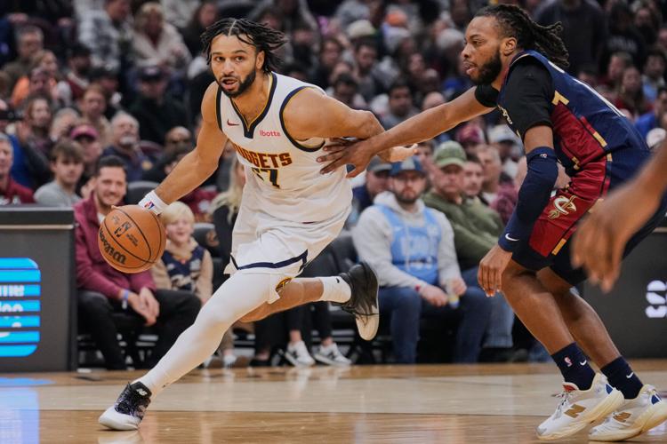 Donovan Mitchell scores 33 points, Cavaliers outlast short-handed ...