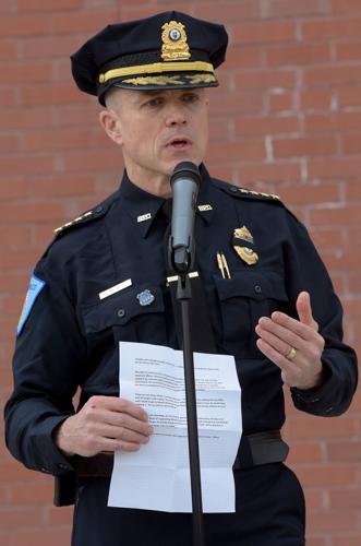 Hundreds gather at vigil in memory of former Lawrence police officer ...