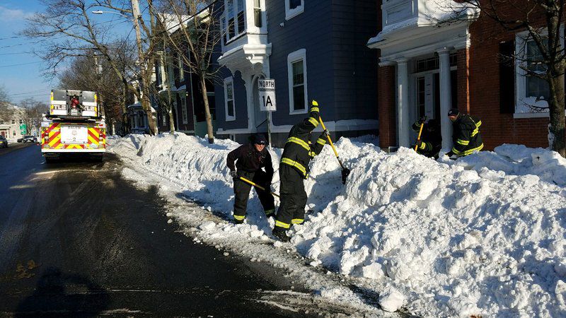 Crews tackle buried hydrants after storm | Local News | salemnews.com