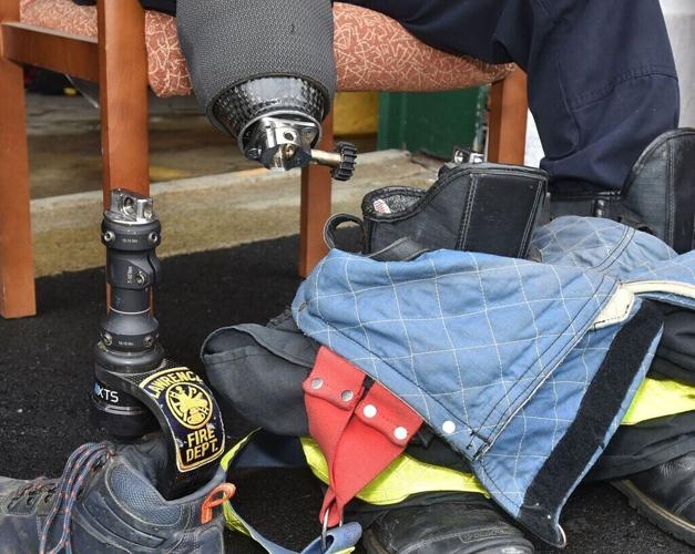 After motorcycle crash, Lawrence firefighter returns to work with ...