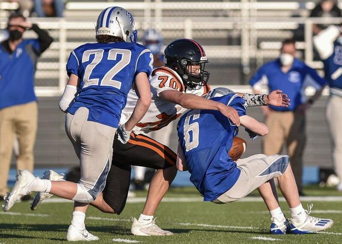 Trailing late, Danvers football comes back to shock Beverly in OT ...