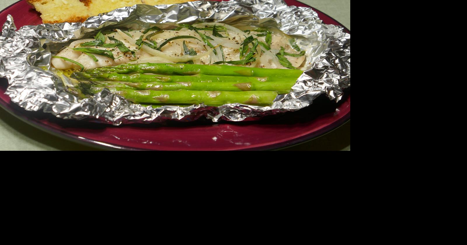 Poisson en papillote (steamed fish parcels) with garlic bread ...