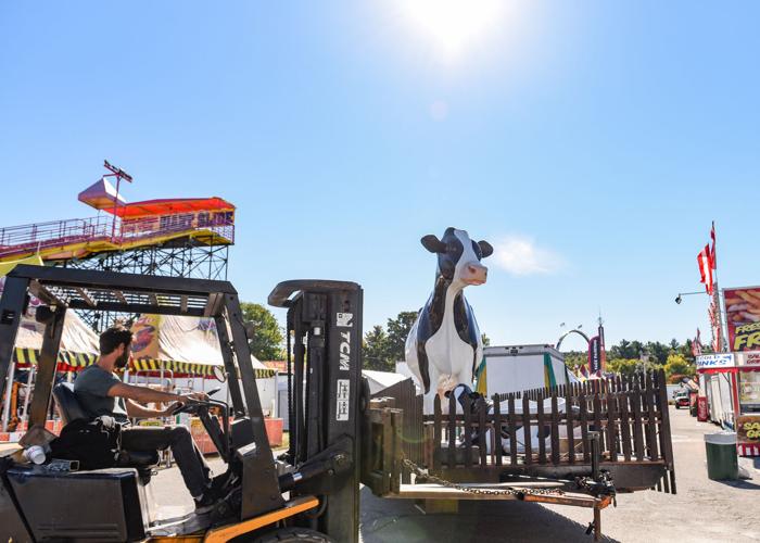 SLIDESHOW: Scenes of preparation on opening day at the Topsfield Fair ...