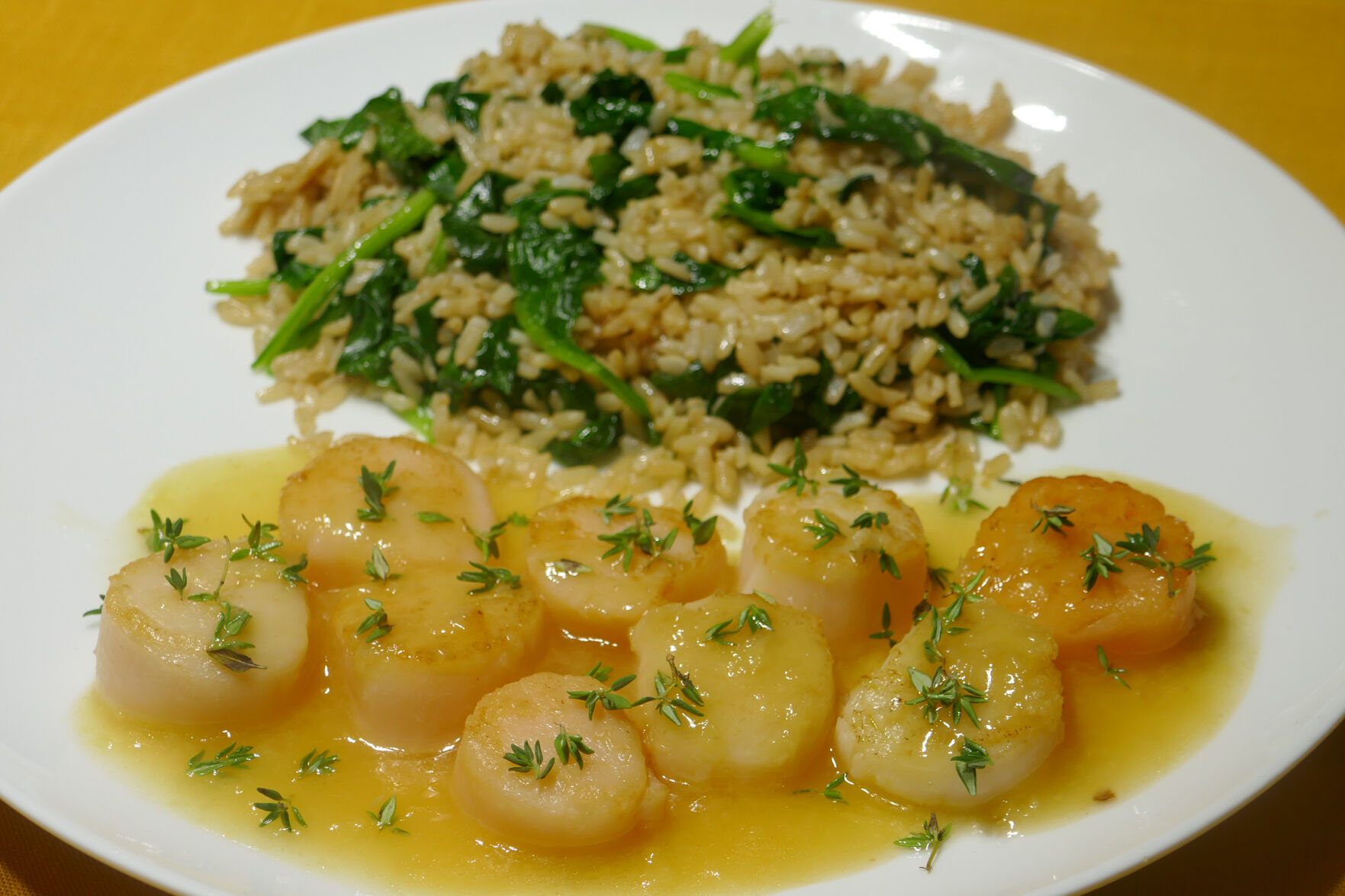 Ginger citrus flavored scallops with rice and spinach | Lifestyles ...