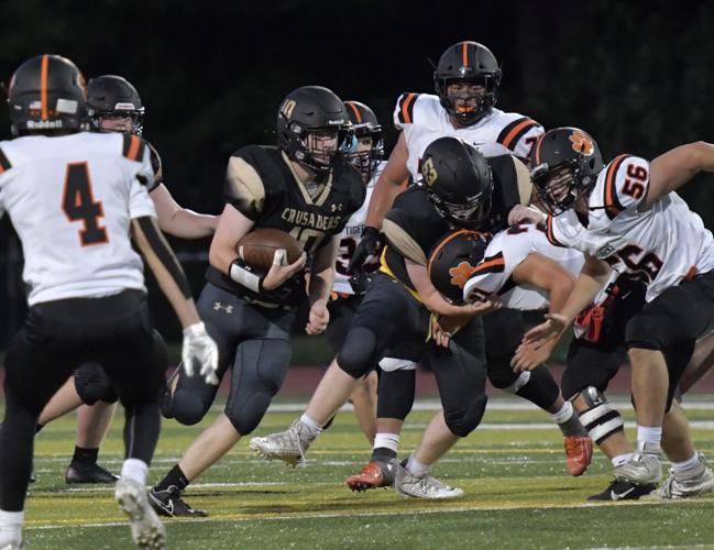 Woods shines in second career start, sends Fenwick football past South ...