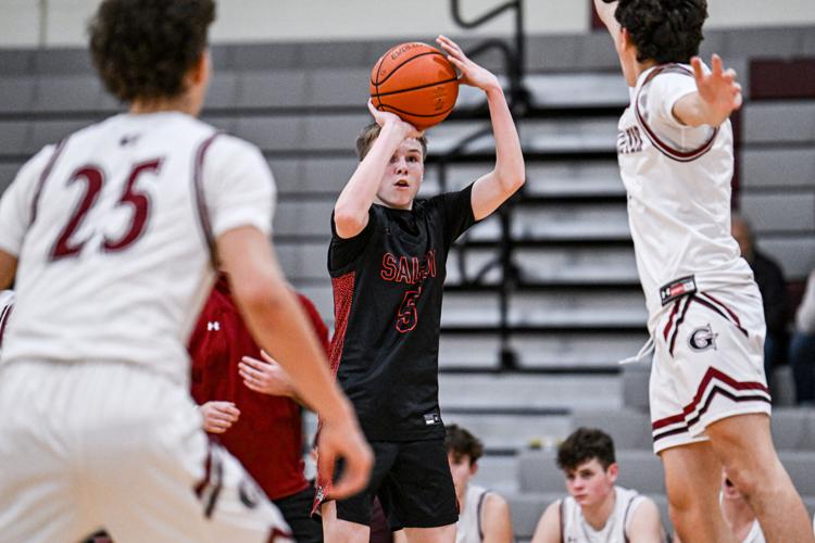 Salem overcomes slow start, races past Gloucester for first win ...