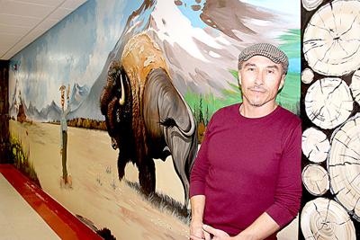 Muralist brings life to blank canvas at AES | Free Share ...