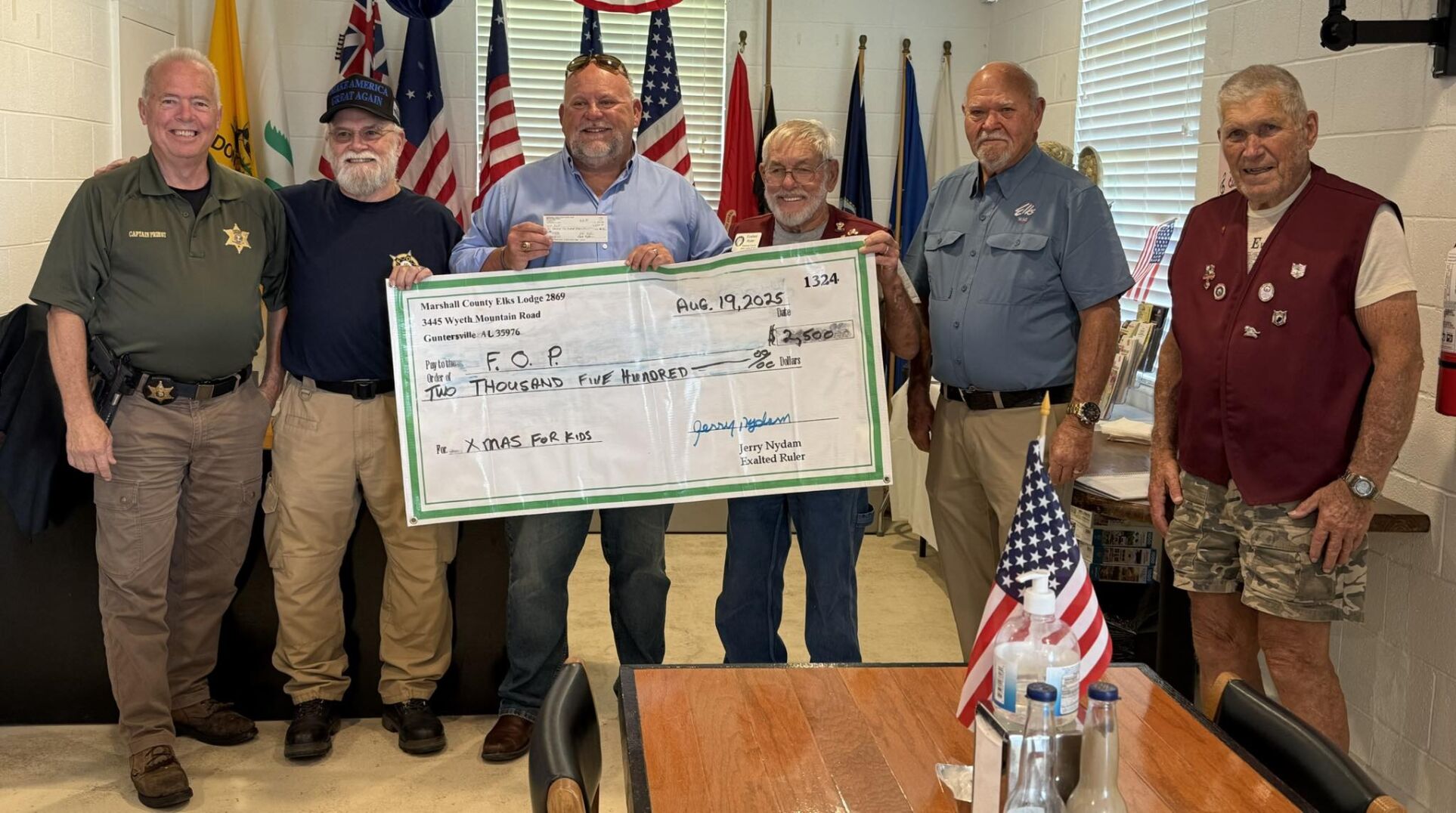 Elk Lodge donation helps “Shop with a Cop” program | News ...