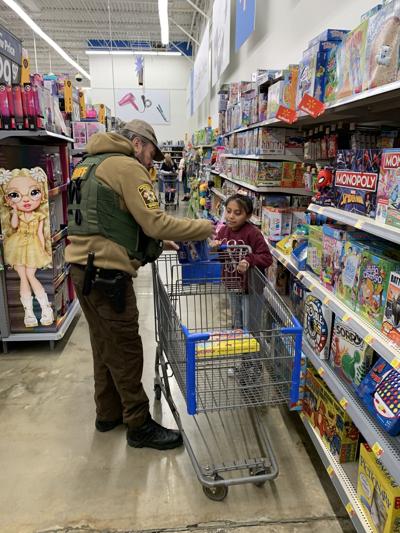 Local law enforcement officers team up for 'Shop With A Cop' | Free ...