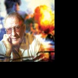 Pearl Harbor survivor Don Stratton of Santa Maria is reflected in a ...