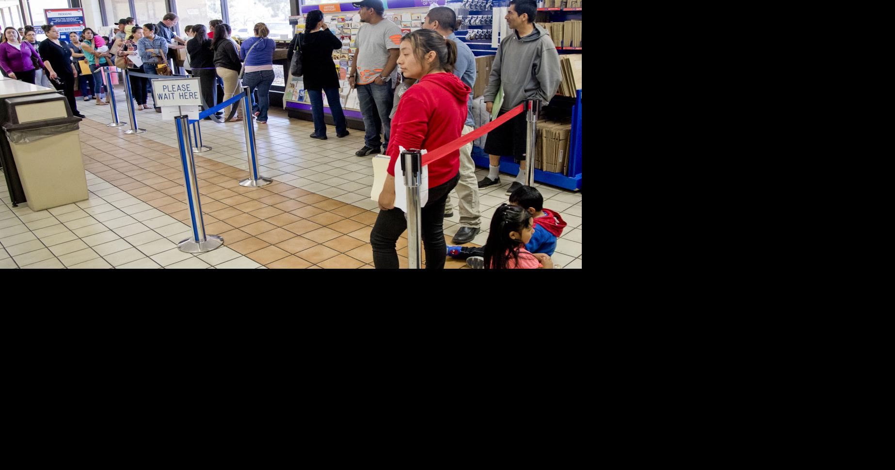 Passport line stretches to door at Santa Maria post office | Features ...