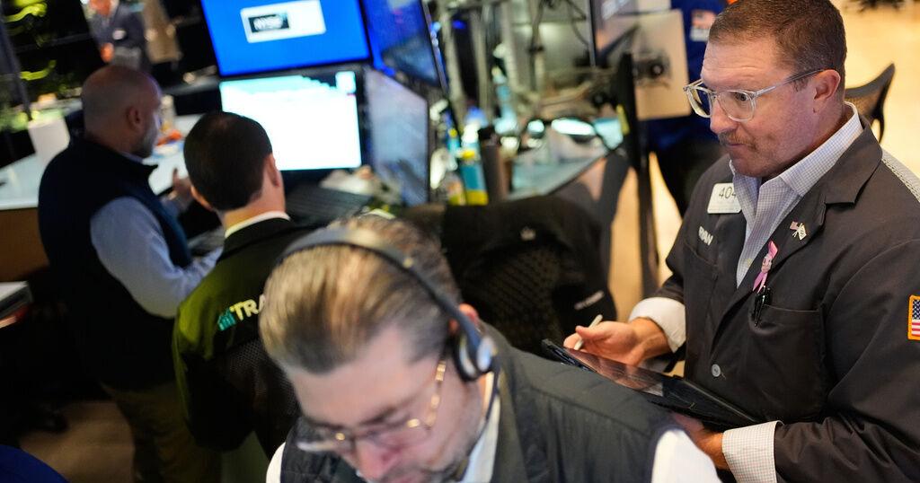 After a day of sharp swings, Wall Street ends nearly where it began ...