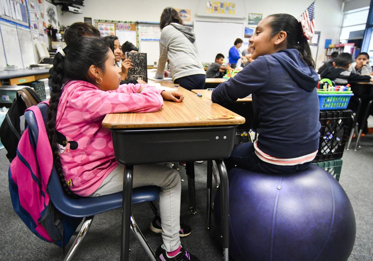 Yoga balls, 'wiggle chairs' improving focus in Adam school classroom ...