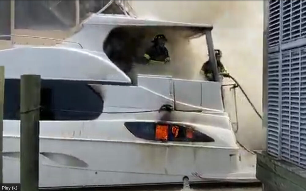 BSL police, firefighters respond to large vessel blaze at Bay harbor ...