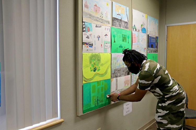 Area children draw themselves as police officers for poster contest ...