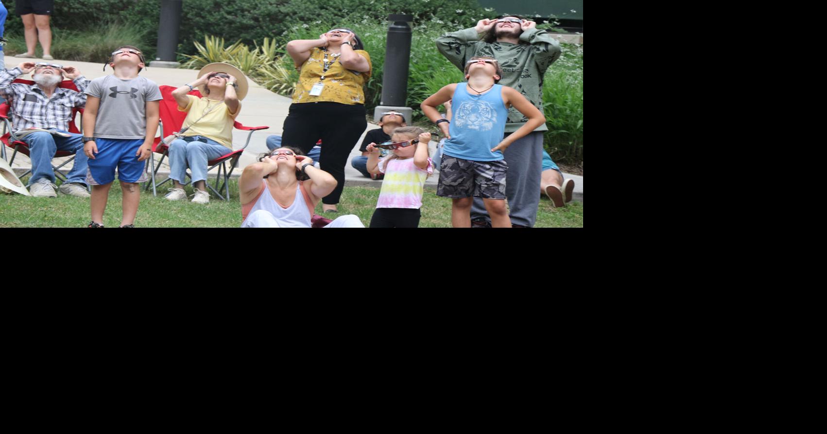 Community members look to the sky in Seguin during solar eclipse ...