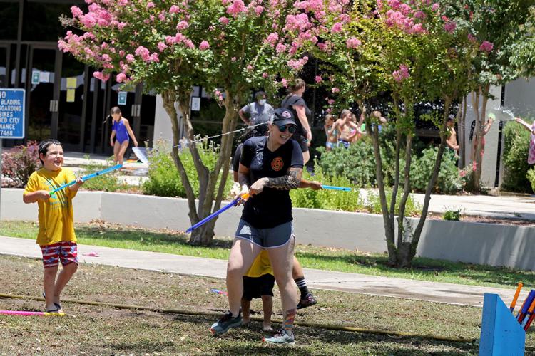 Seguin firefighters, summer campers engage in water fight | News ...
