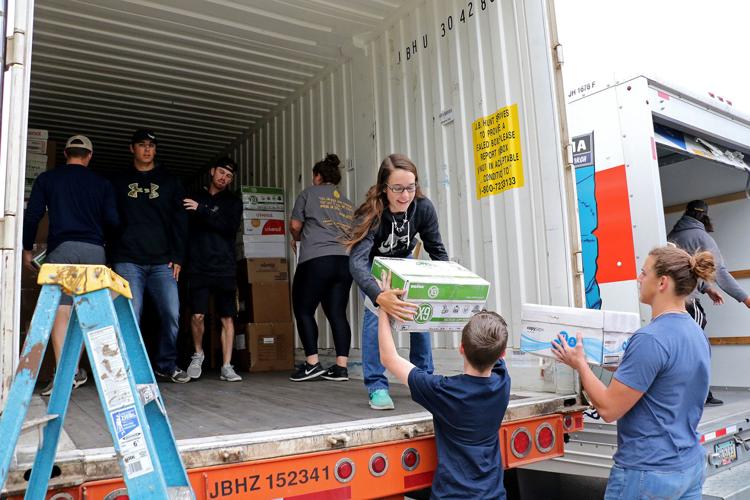 HELPING HANDS: Locals pitch in to help Lutheran charity | News ...