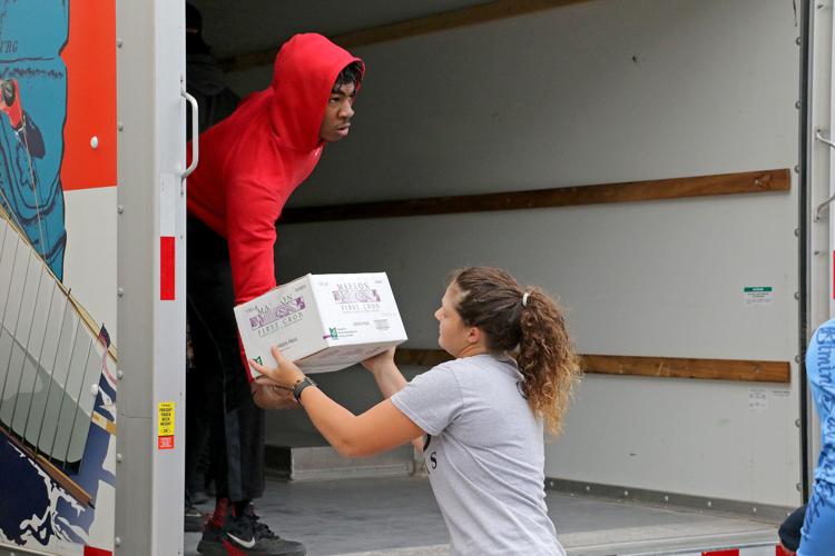 HELPING HANDS: Locals pitch in to help Lutheran charity | News ...