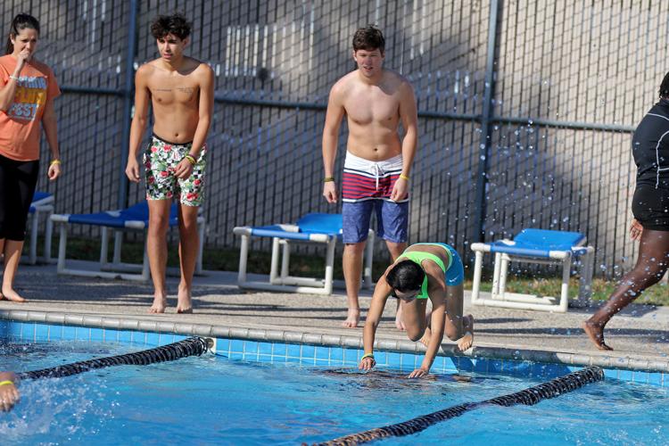 TLU students dive into finals study with run, swim | News ...