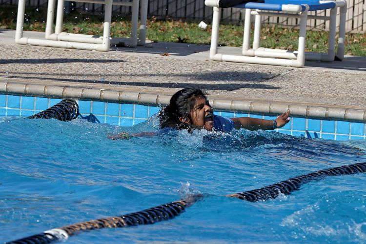 TLU students dive into finals study with run, swim | News ...