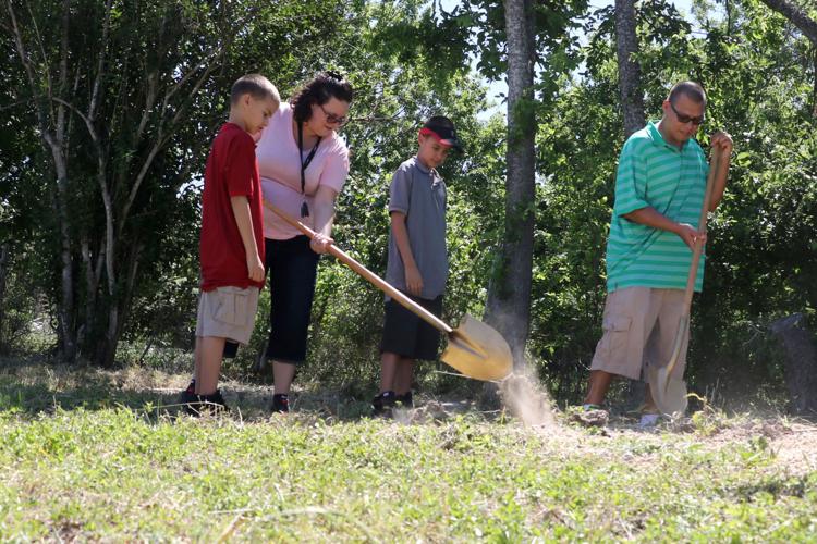 Habitat, local family break ground on new house | News | seguingazette.com