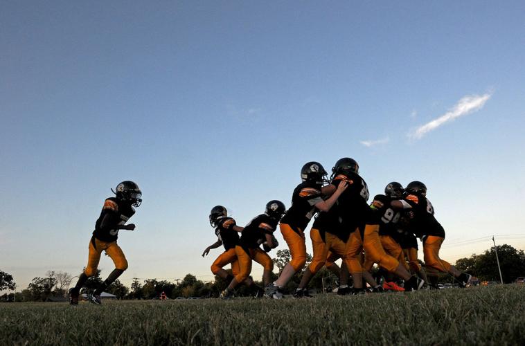 Seguin youth football coach teaches winning in football, life | News ...