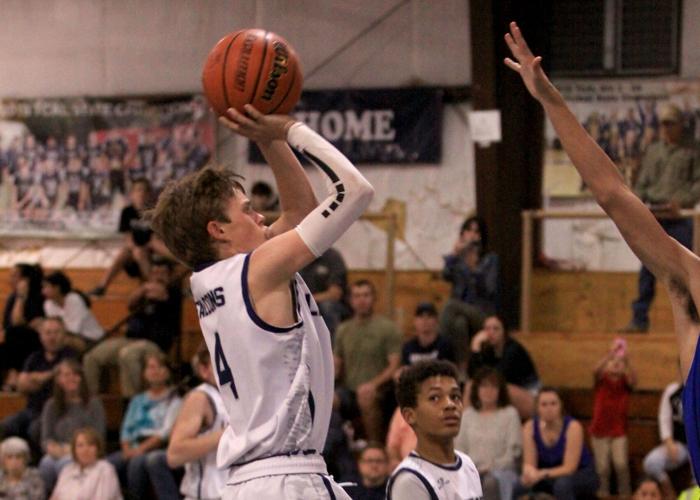 Falcons edge out Saints, 60-52, in district contest | Sports ...