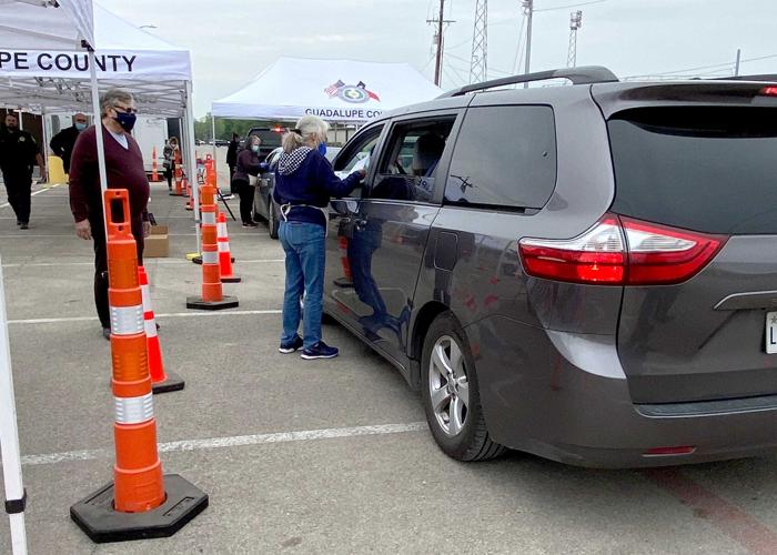 Officials: Drive-thru clinic success, 600 get shot on the go | News ...