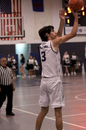 Falcons edge out Saints, 60-52, in district contest | Sports ...